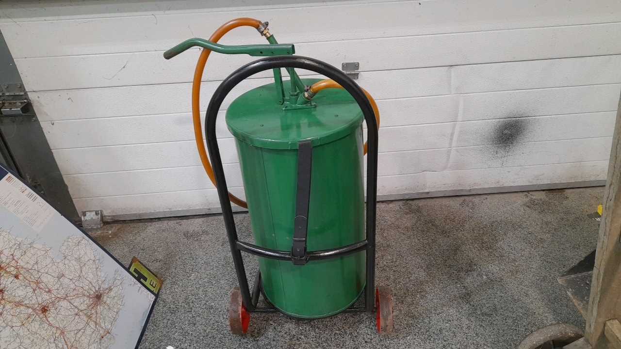 Lot 539 - 55 LITRE OIL DISPENCER CAST TROLLEY