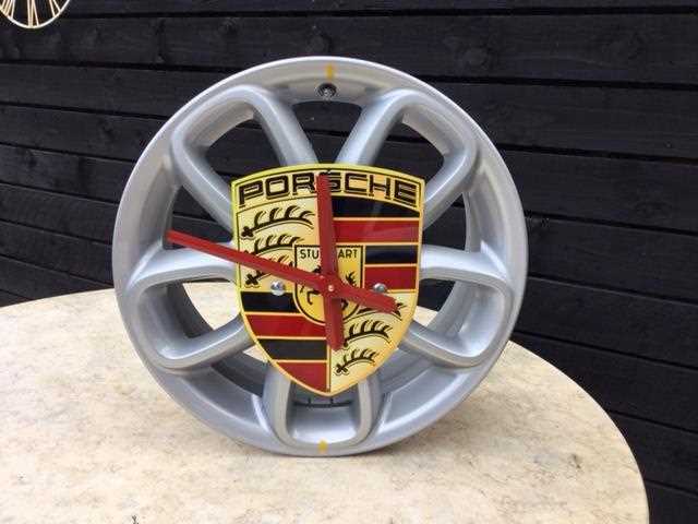 Lot 273 - PORSCHE ALLOY WHEEL CLOCK