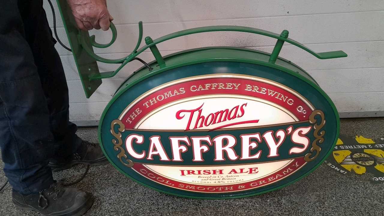 Lot 221 - THOMAS CAFFREY'S IRISH ALE ,DOUBLE SIDED,