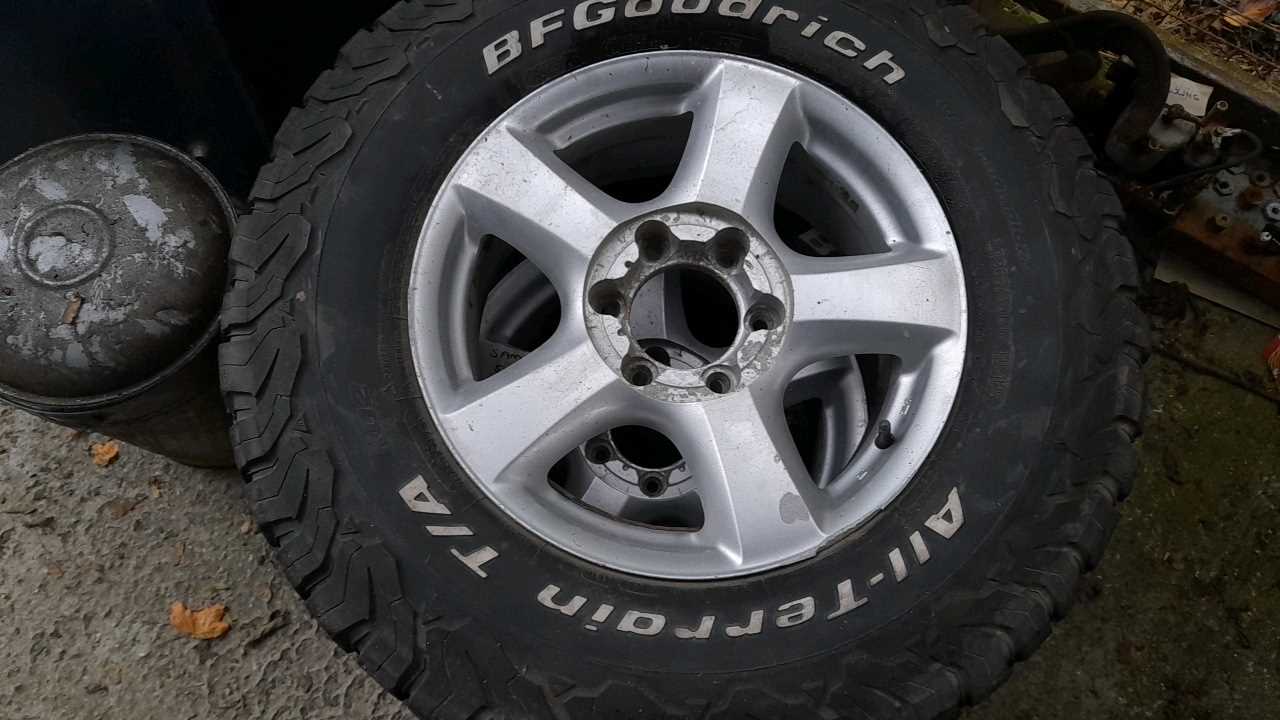 Lot 427 - ISUZU D MAX ALLOY WHEELS AND TYRES 17" SET