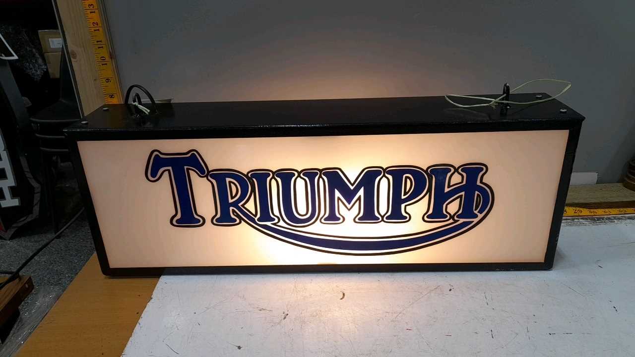 Lot 379 - TRIUMPH LIGHT UP SIGN 25"X9"