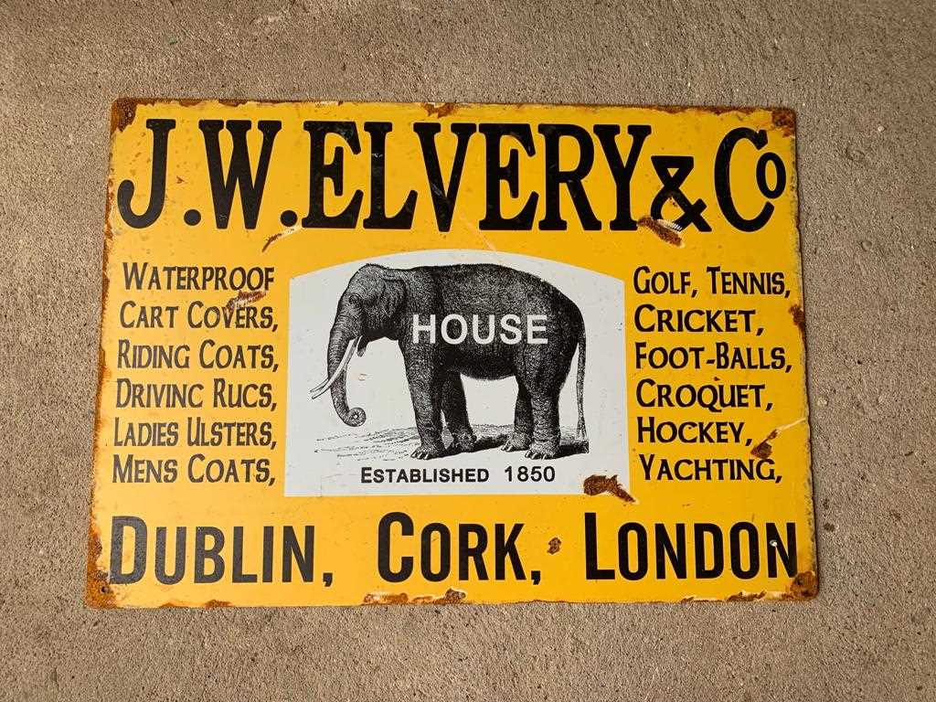 Lot 559 - J.W.ELVERY & CO SIGN 27" X 20"