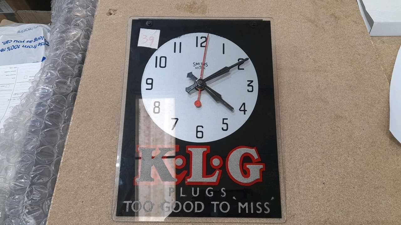 Lot 423 - KLG PLUGS WALL CLOCK