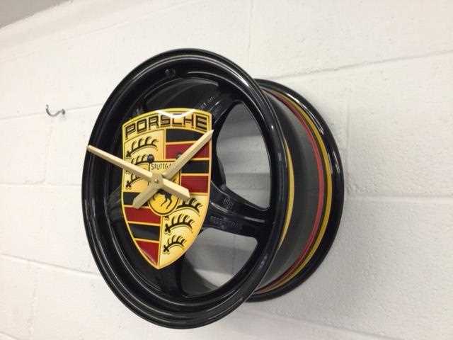 Lot 257 - PORSCHE ALLOY WHEEL CLOCK