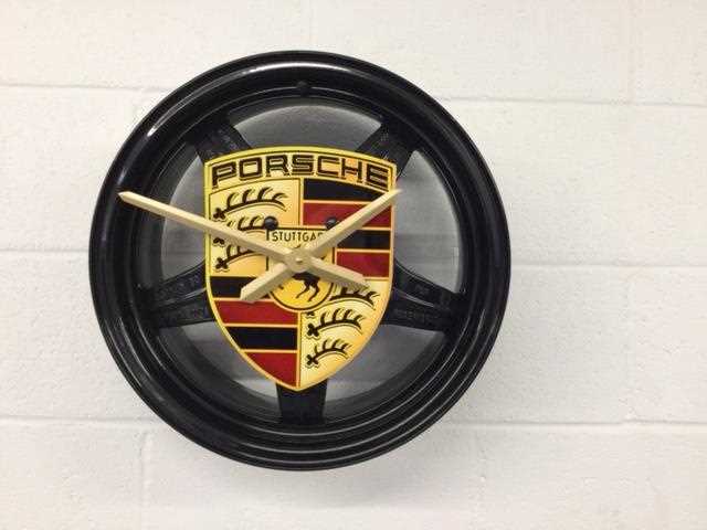 Lot 257 - PORSCHE ALLOY WHEEL CLOCK