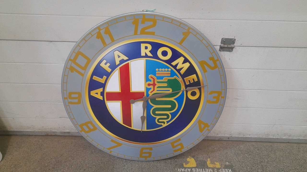 Lot 319 - ALFA ROMEO CLOCK PAINTED AND LACQUERED ON