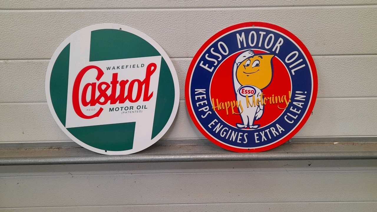 Lot 629 - CASTROL & ESSO DRIP ROUND 14" SIGNS
