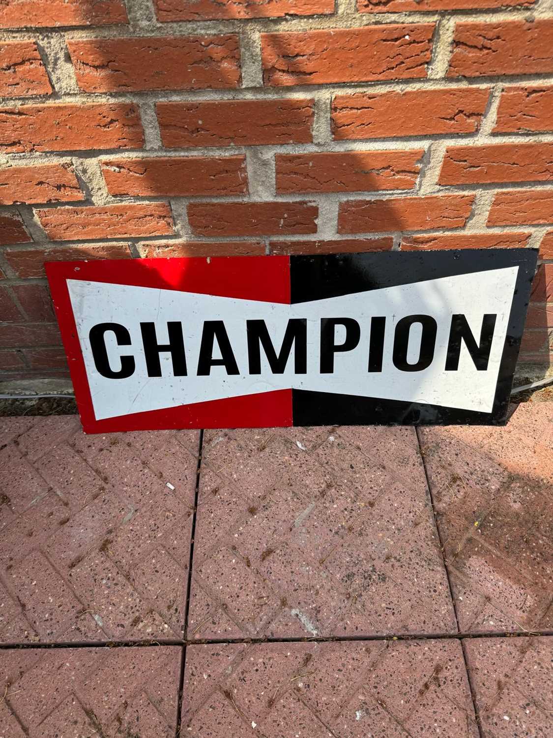 Lot 410 - CHAMPION PLUG SIGN 34" X 14"