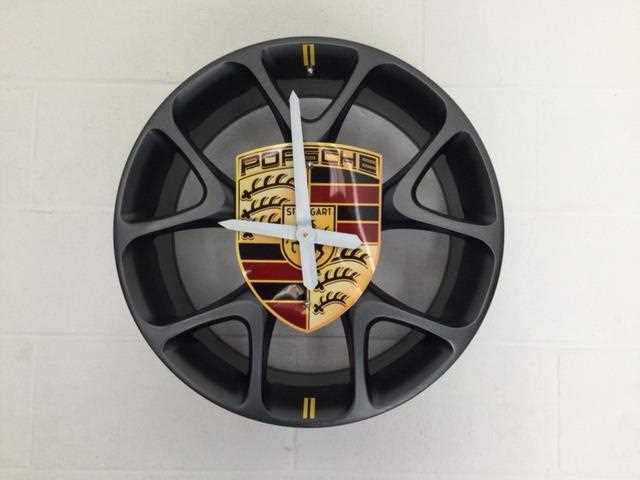 Lot 155 - PORSCHE ALLOY WHEEL CLOCK