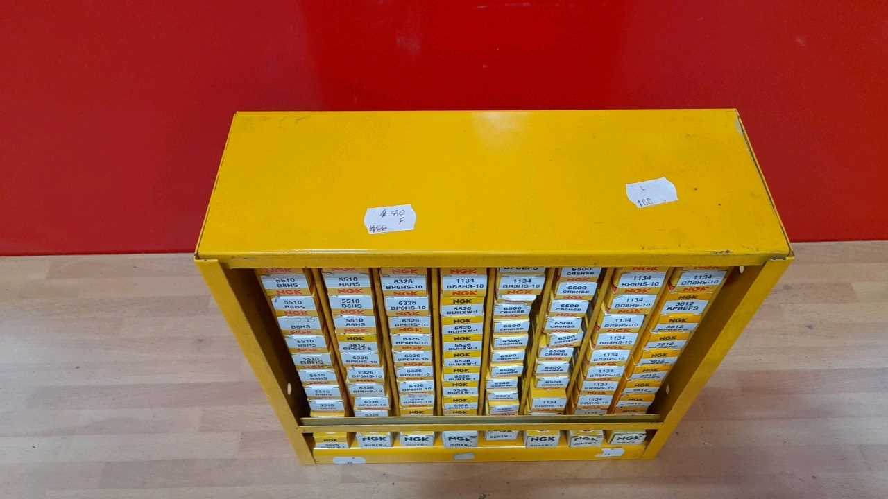 Lot 65 - N.G.K SPARK PLUG RACK COMPLETE WITH SPARK