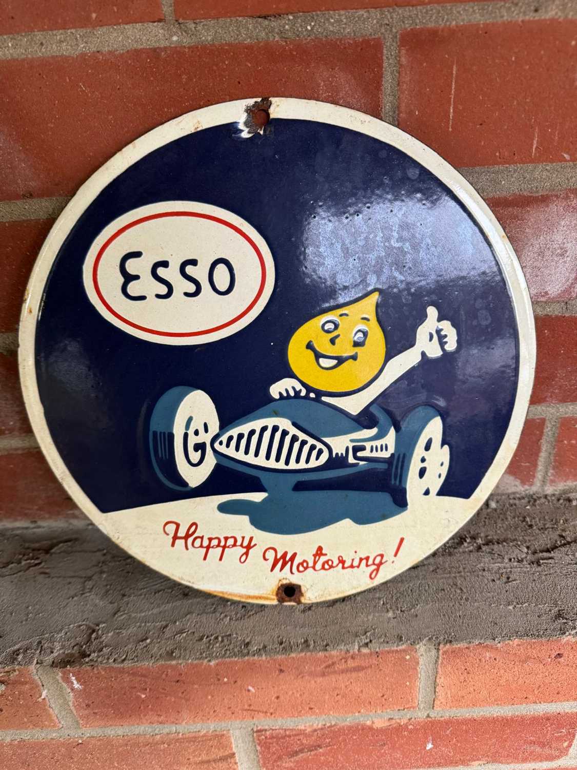 Lot 401 - ESSO MR DRIP HAPPY MOTORING ENAMEL SIGN 11"