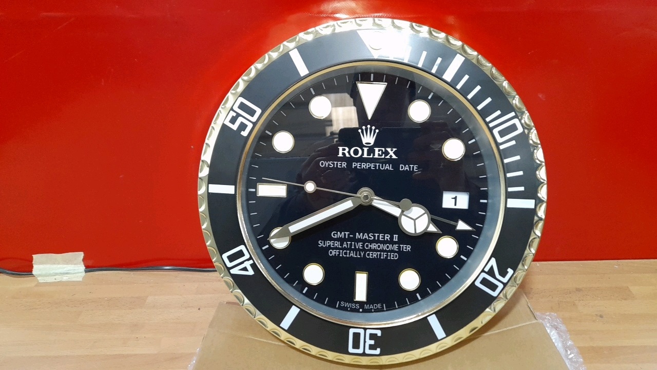 Lot 637 - OFFICIALLY - LICENSED ROLEX WALL CLOCK 13"