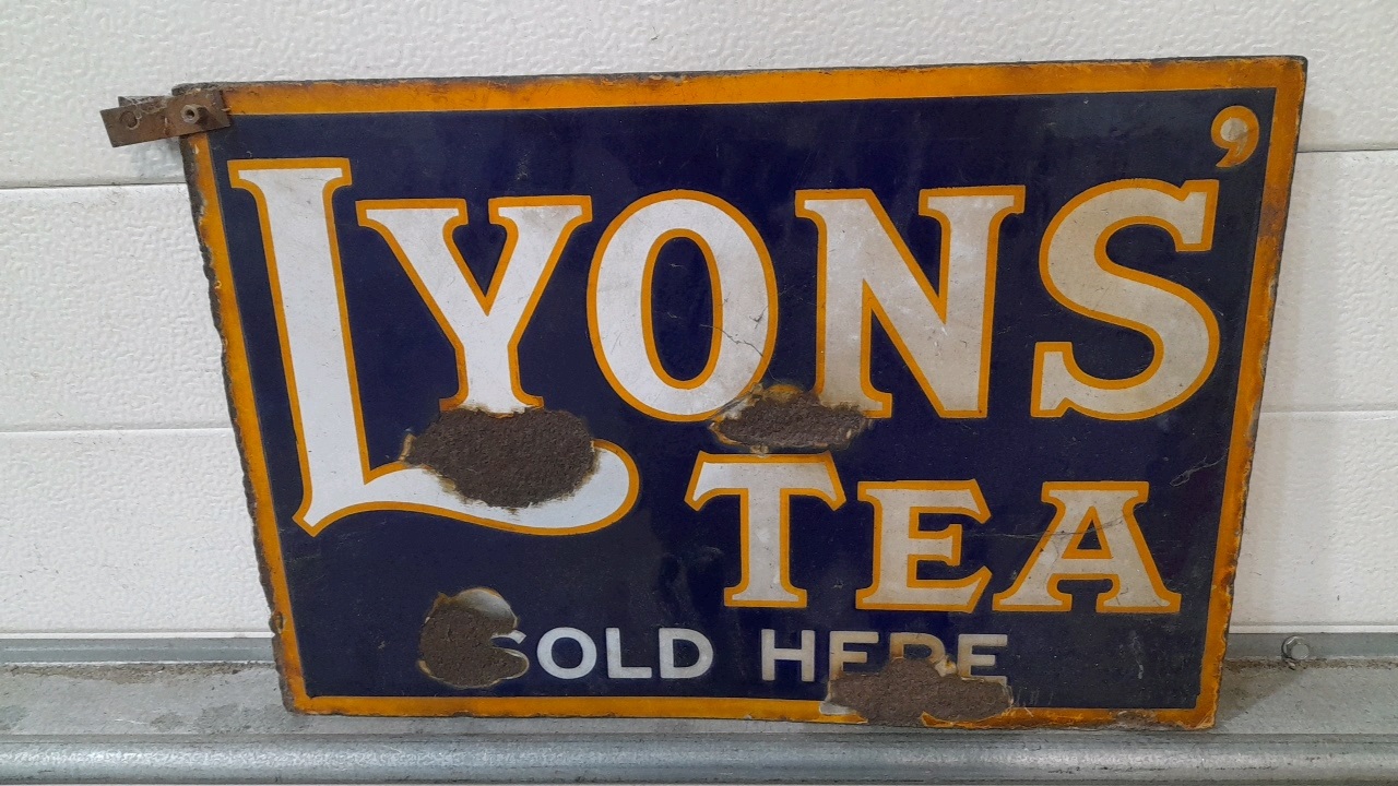 Lot 245 - LYONS TEA SOLD HERE DOUBLE SIDED ENAMEL SIGN