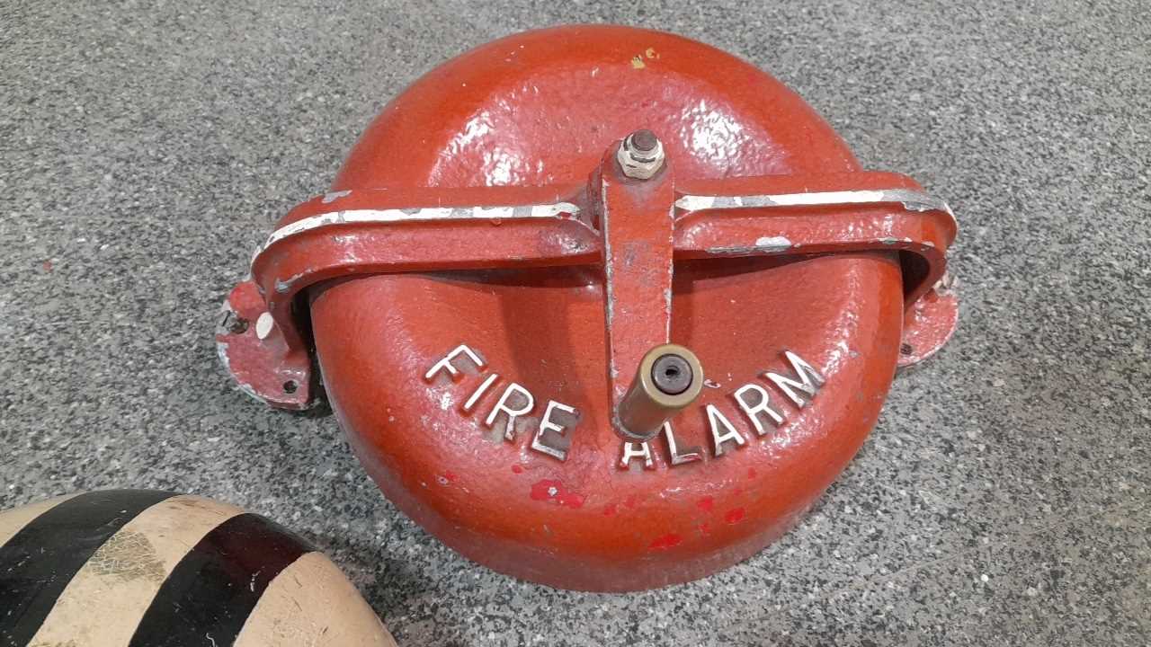 Lot 397 - VINTAGE MOTOR CYCLE HELMETS & RED FIRE BELL