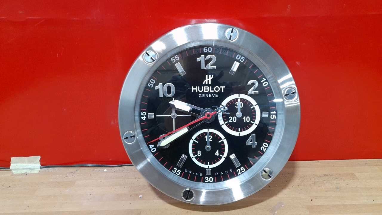 Lot 699 - HUBLOT WALL CLOCK 13"