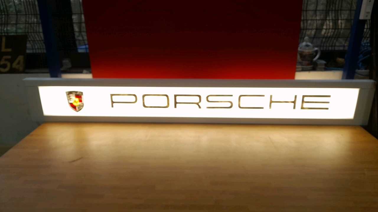 Lot 529 - PORSCHE LIGHT UP SIGN 63.5 " X 8"