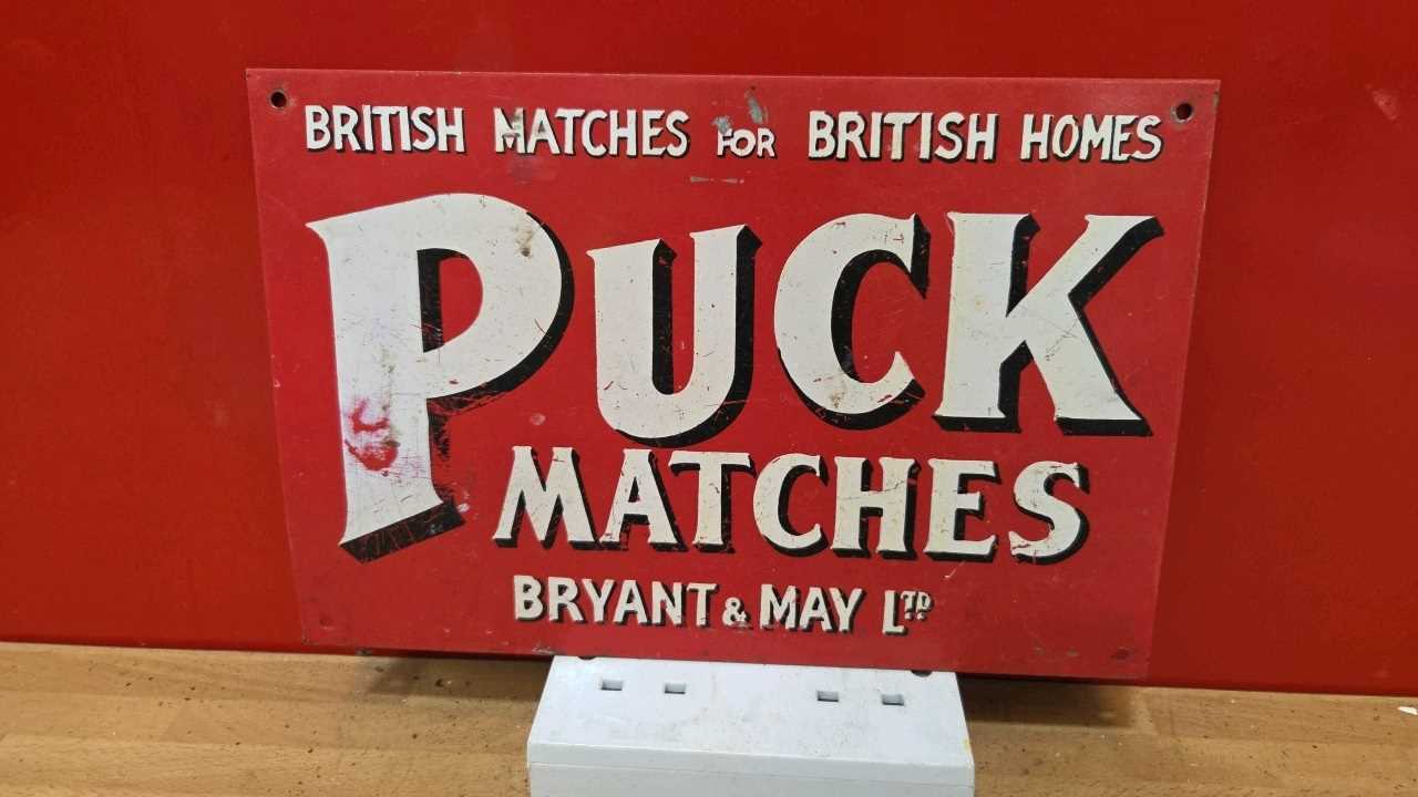 Lot 563 - PUCK MATCHES ENAMEL SIGN 12" X 8"