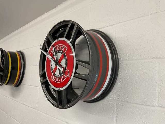 Lot 141 - REDEX ALLOY WHEEL CLOCK