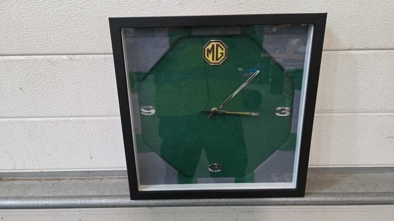 Lot 805 - MG WALL CLOCK 13" X 13"