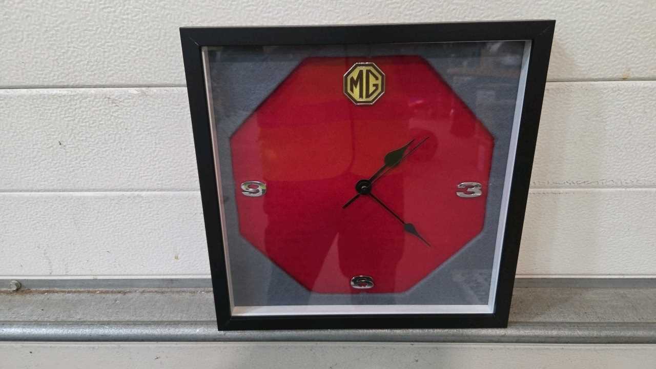 Lot 807 - MG WALL CLOCK 13" X 13"