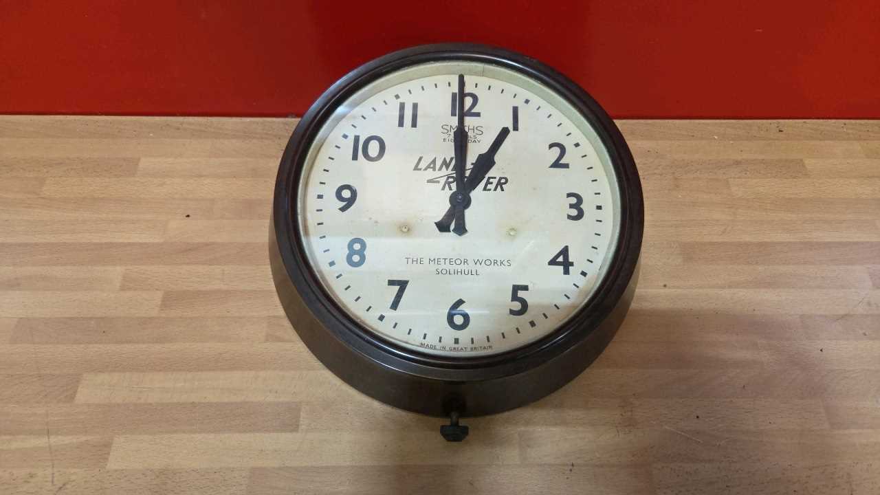 Lot 383 - LAND ROVER CLOCK 9" DIA