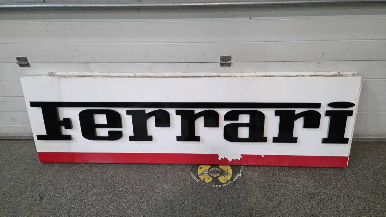 Lot 387 - FERRARI SIGN WITH RAISED LETTERS 79" X 23"