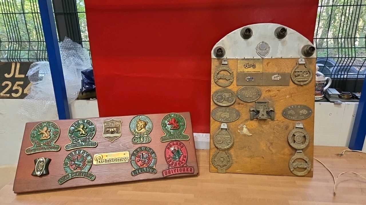 Lot 197 - BRASS PLAQUES MOUNTED ON 2 WOODEN BOARDS