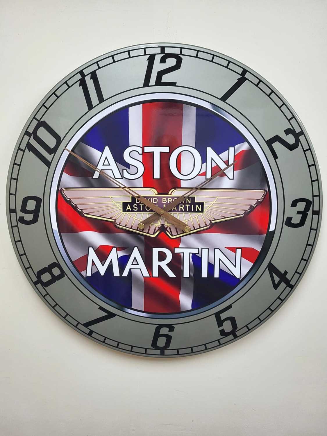 Lot 607 - HANDMADE 32" ASTON MARTIN CLOCK