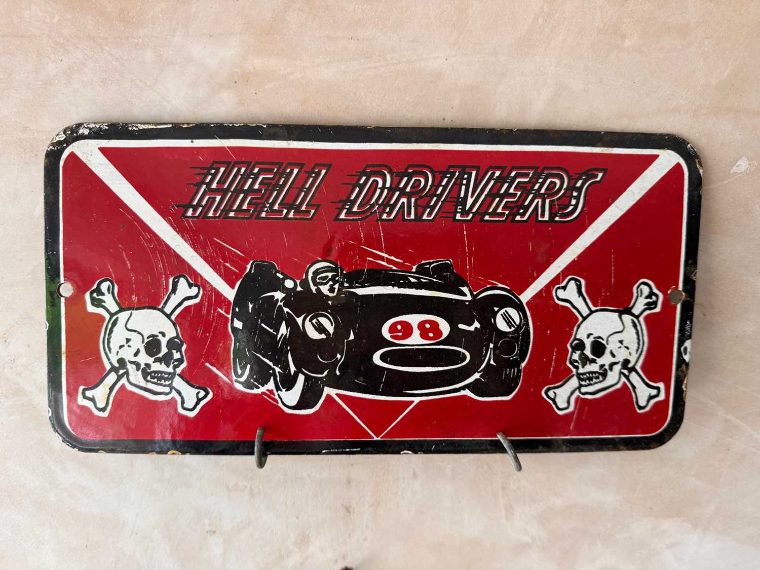 Lot 465 - HELL DRIVERS ENAMEL SIGN 12" X 6"