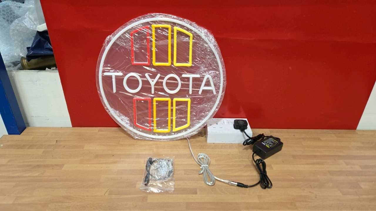 Lot 259 - NEON TOYOTA LIGHT UP SIGN 16" DIA