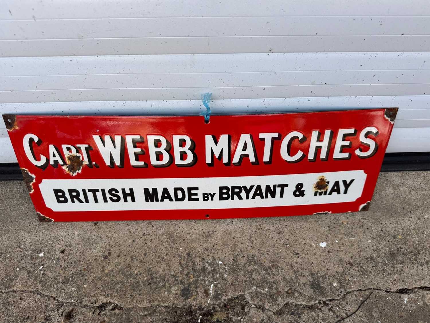 Lot 737 - CAPT.WEBB MATCHES ENAMEL SIGN 24" X 8"