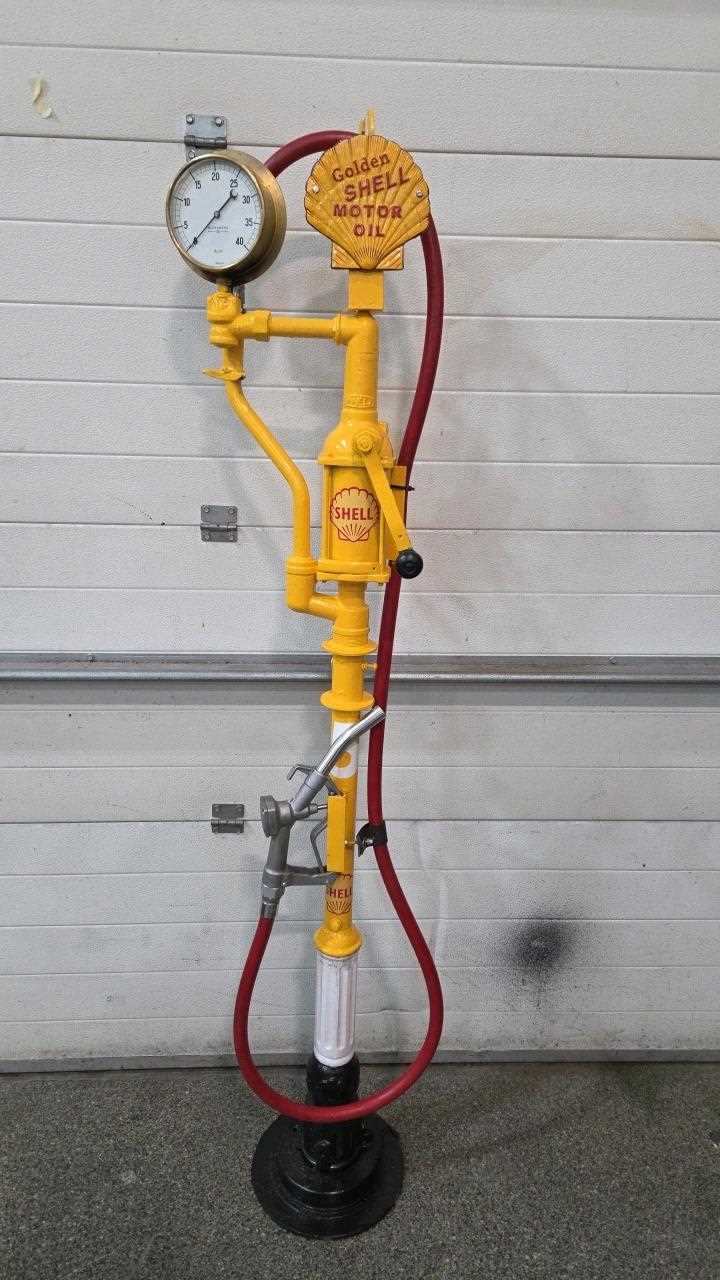 Lot 615 - VINTAGE STYLE SHELL PUMP