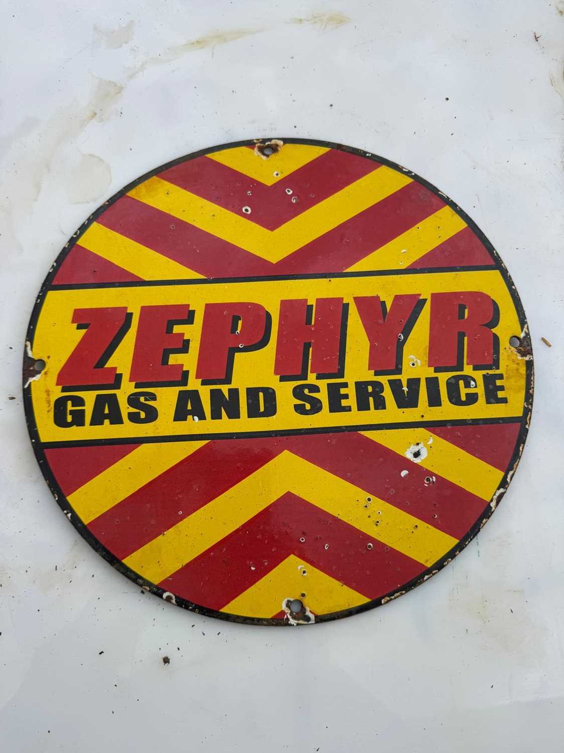 Lot 417 - ZEPHYR GAS AND SERVICE ENAMEL SIGN 12" DIA