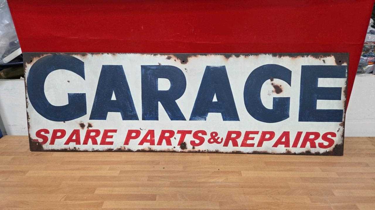 Lot 117 - HAND PAINTED GARAGE SPARE PARTS & REPAIRS