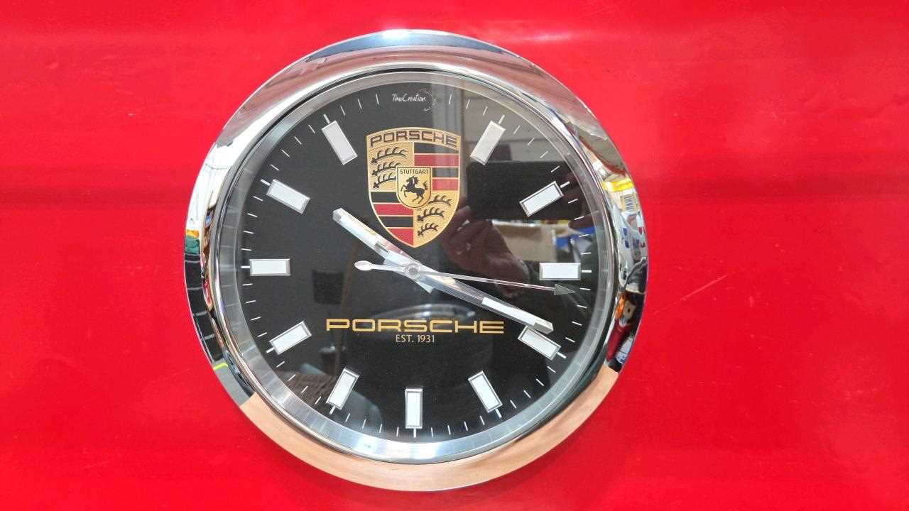 Lot 509 - PORSCHE STYLE WALL CLOCK