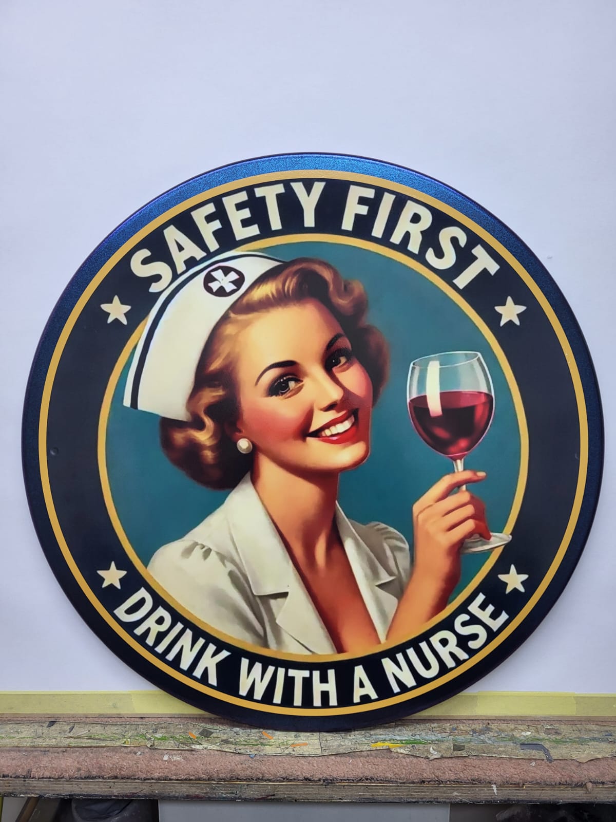 Lot 703 - 22" DIAMETER SAFETY FIRST SIGN