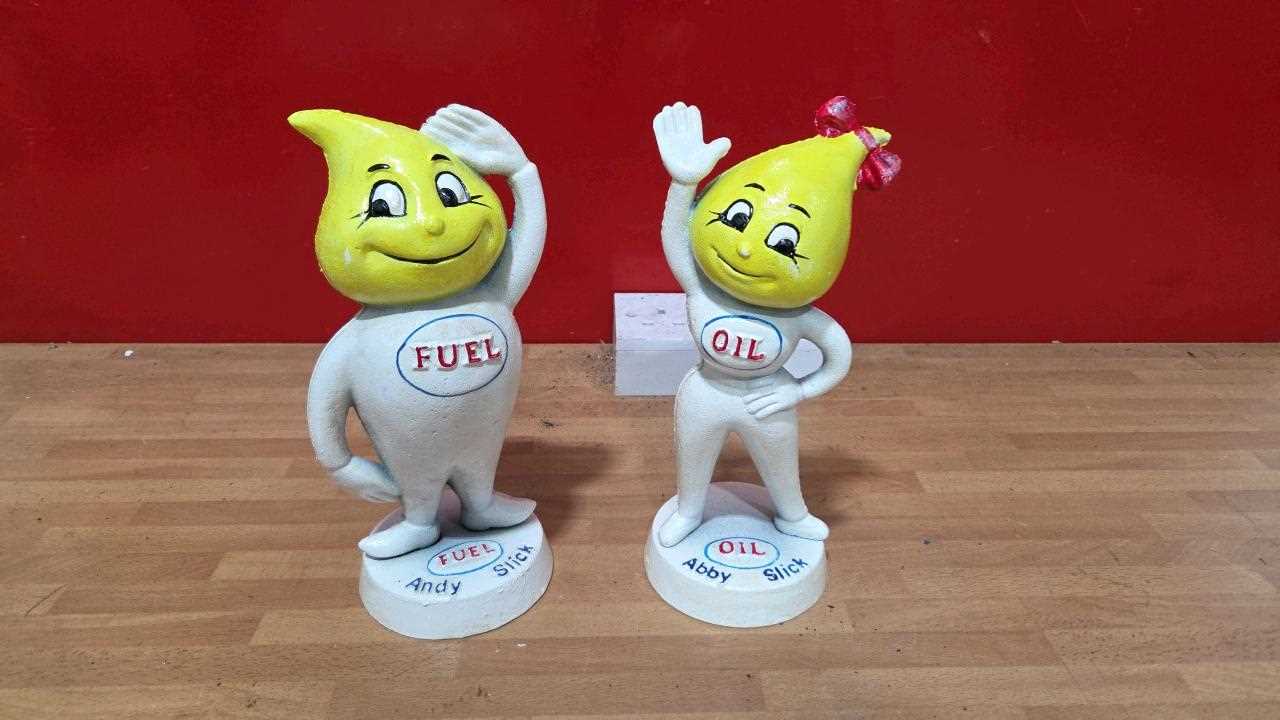 Lot 393 - PAIR OF MR & MRS DRIP CAST MONEY BOXES 10"