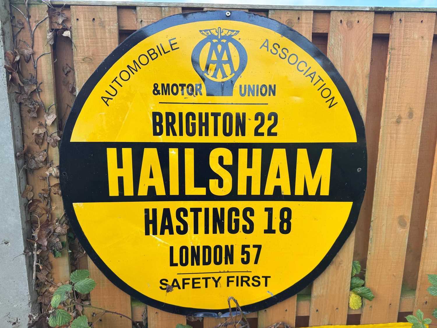 Lot 633 - AA HAILSHAM PAINTED METAL SIGN 29" DIA