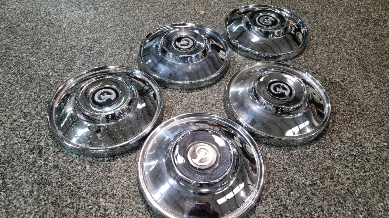 Lot 359 - DAIMLER HUBCAPS