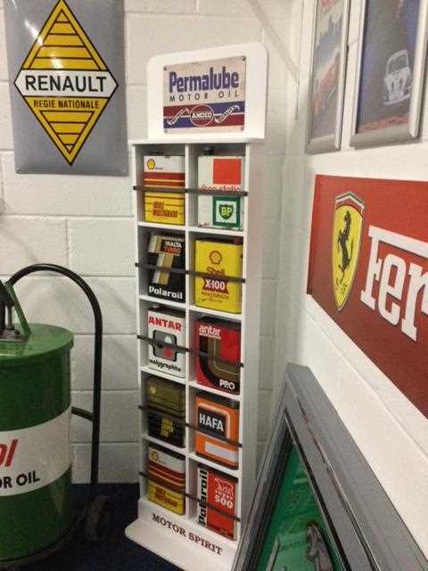 Lot 271 - VINTAGE OIL CAN DISPLAY IN CUSTOM MADE