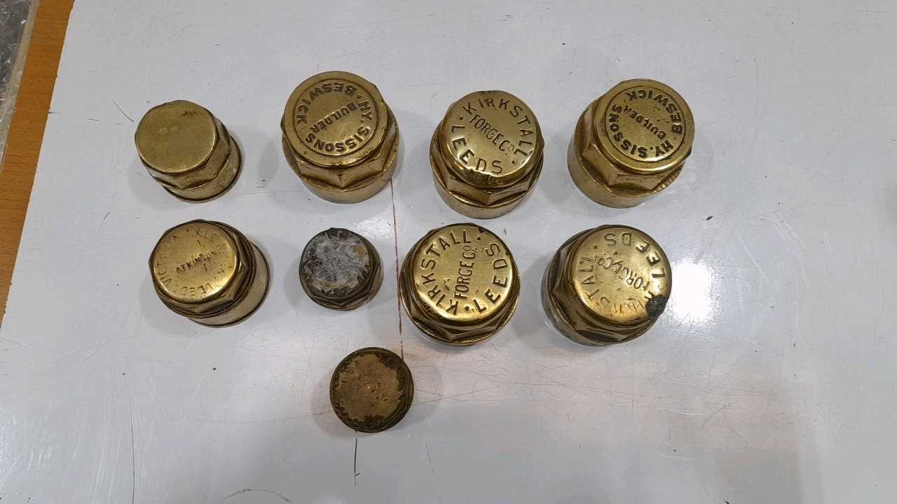 Lot 54 - BRASS WHEEL HUB CAPS